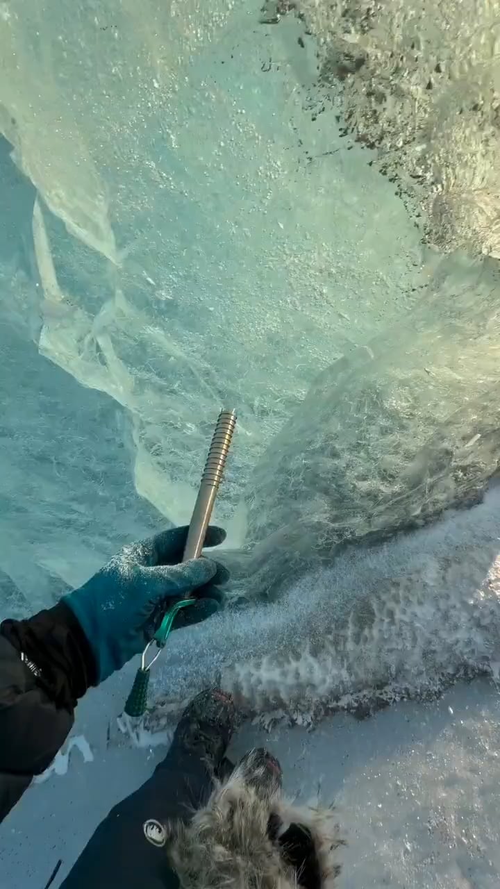 Ice screw in crystal clear ice – Oddly Satisfying: Viral & Trending Finds